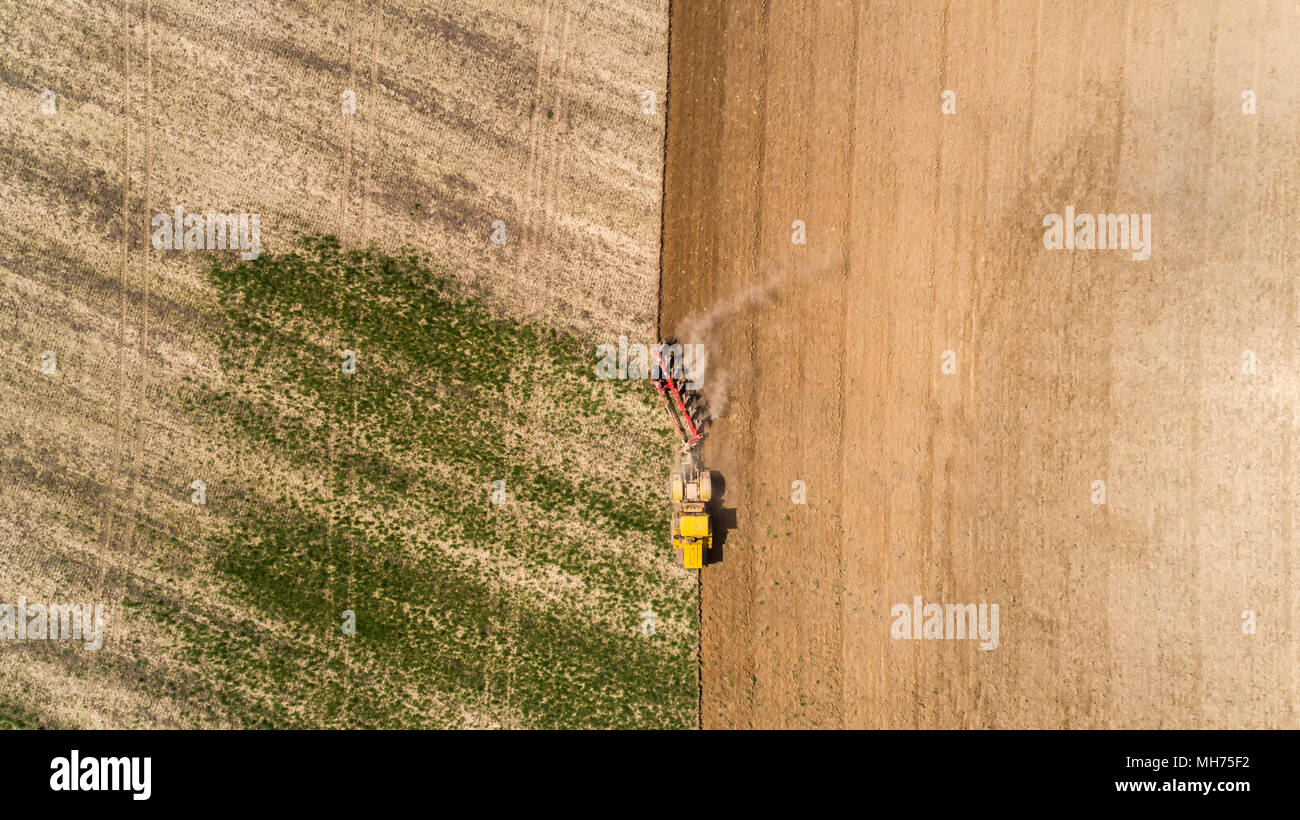 Aerial view of a tractor on a field Stock Photo - Alamy
