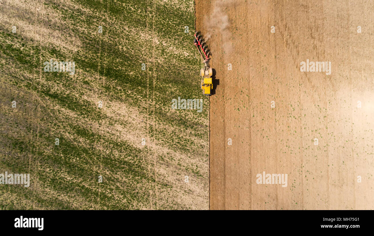 Aerial view of a tractor on a field Stock Photo - Alamy