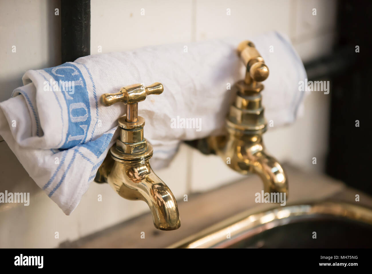 Detail image of old Victorian brass taps in mansion house kitchen Stock ...