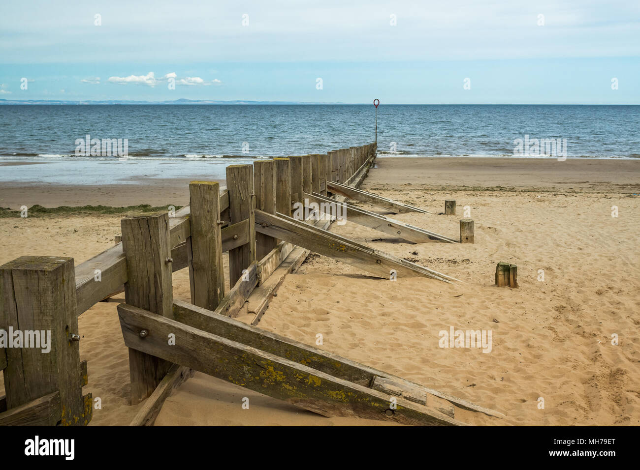 Wooden Groynes Pillars at Beach Stock Photo - Alamy