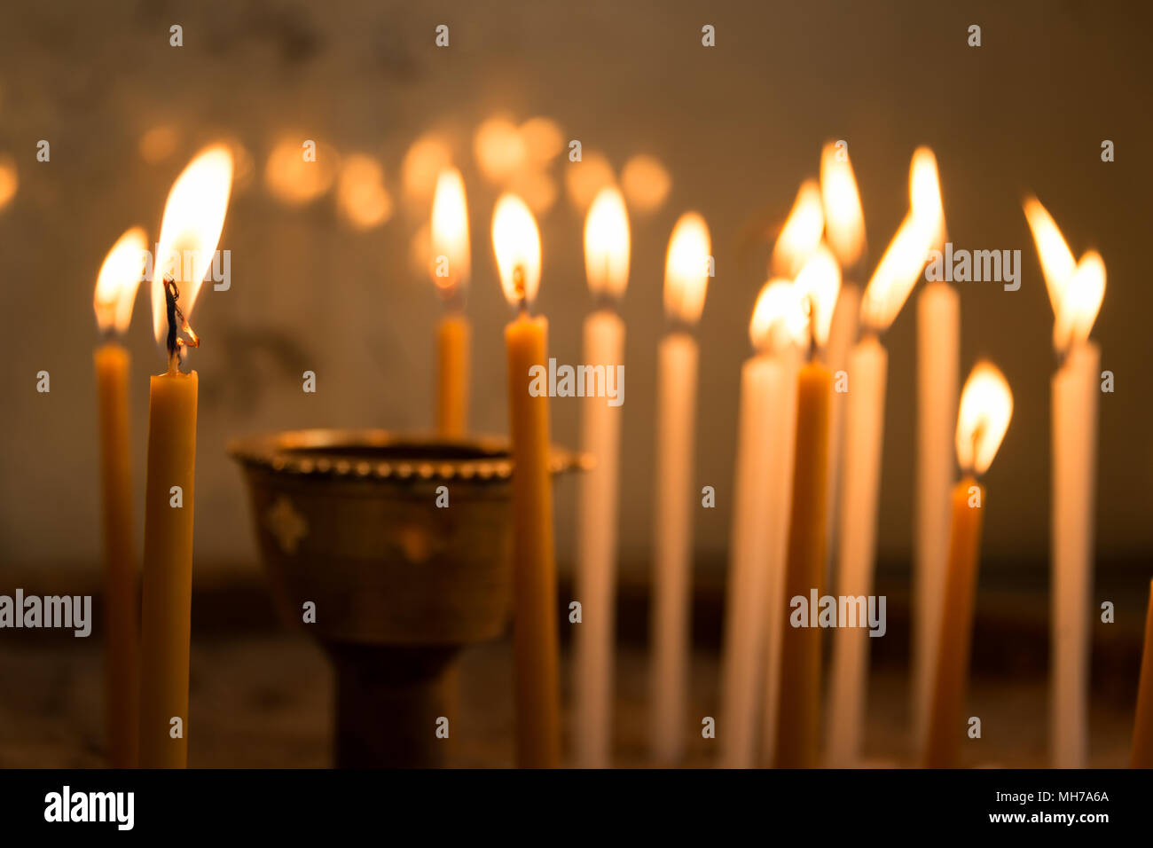 Offering candles in a church hi-res stock photography and images - Alamy