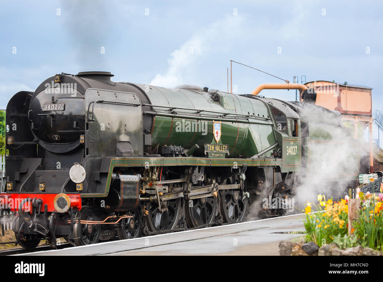 Preserved UK steam locomotive taking on water on Severn Valley Railway ...