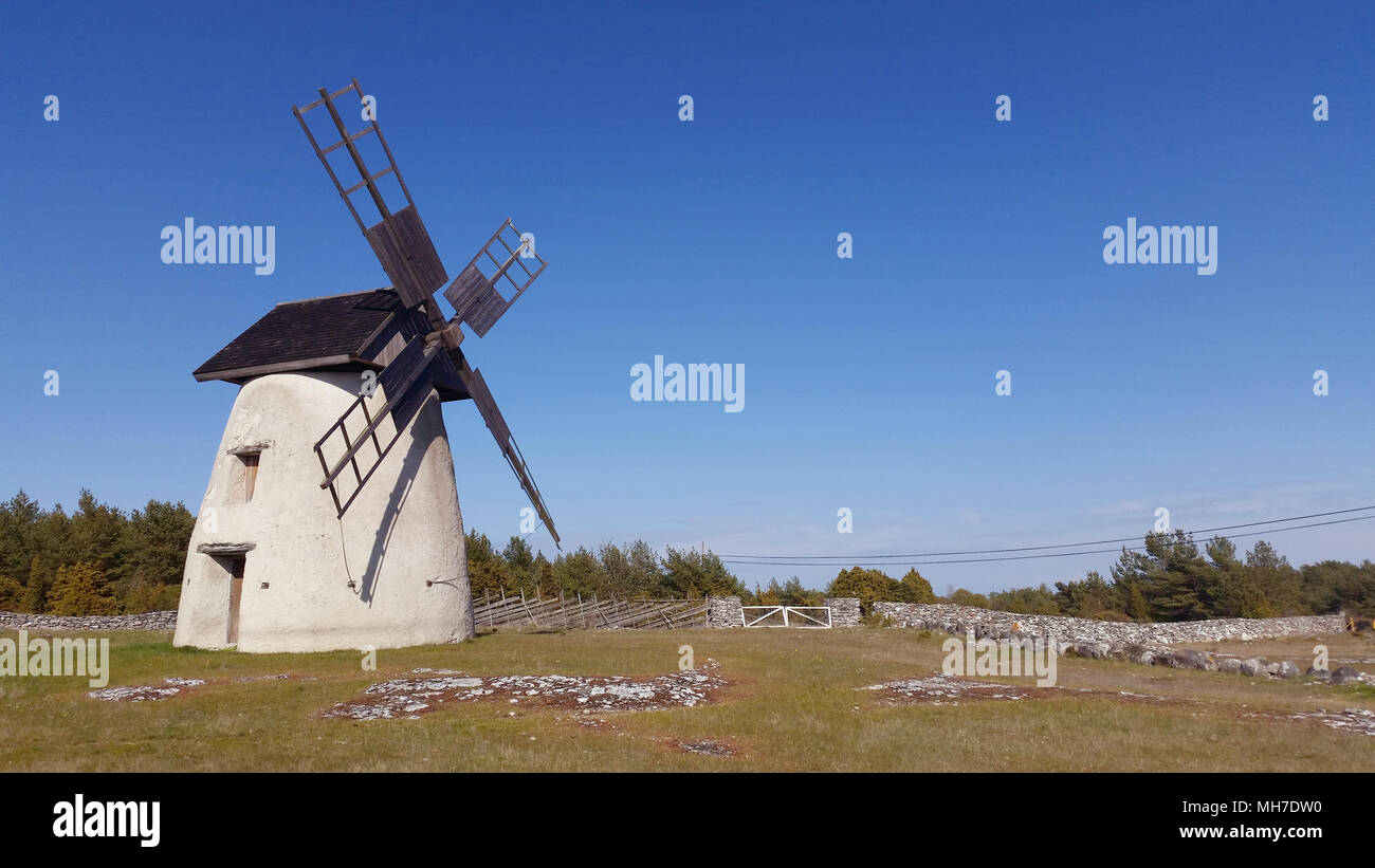 Old tower mill type windmill located at the Swedish Faro island in the ...