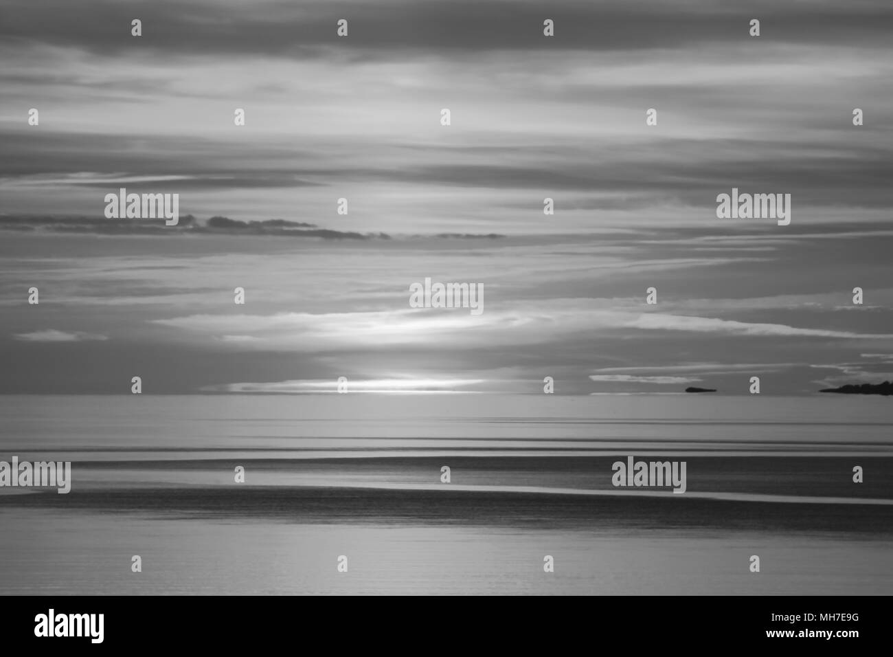 Setting sun clouds Black and White Stock Photos & Images - Alamy