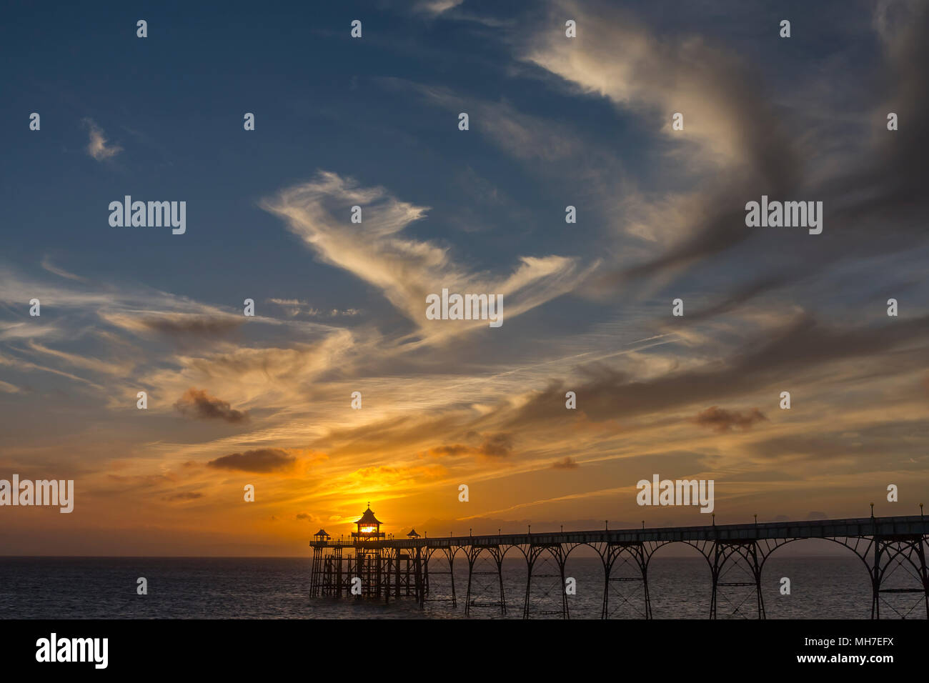 Clevedon pier at sunset taken from the beach Clevedon Seafront Stock ...