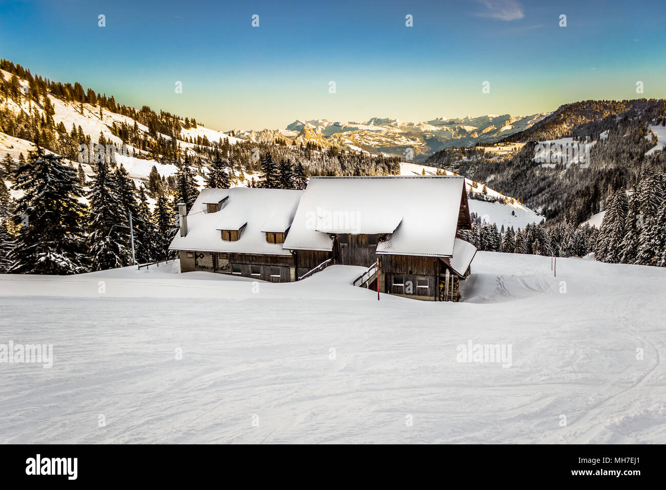 Farmhouse in Snowy Mountains Stock Photo - Alamy
