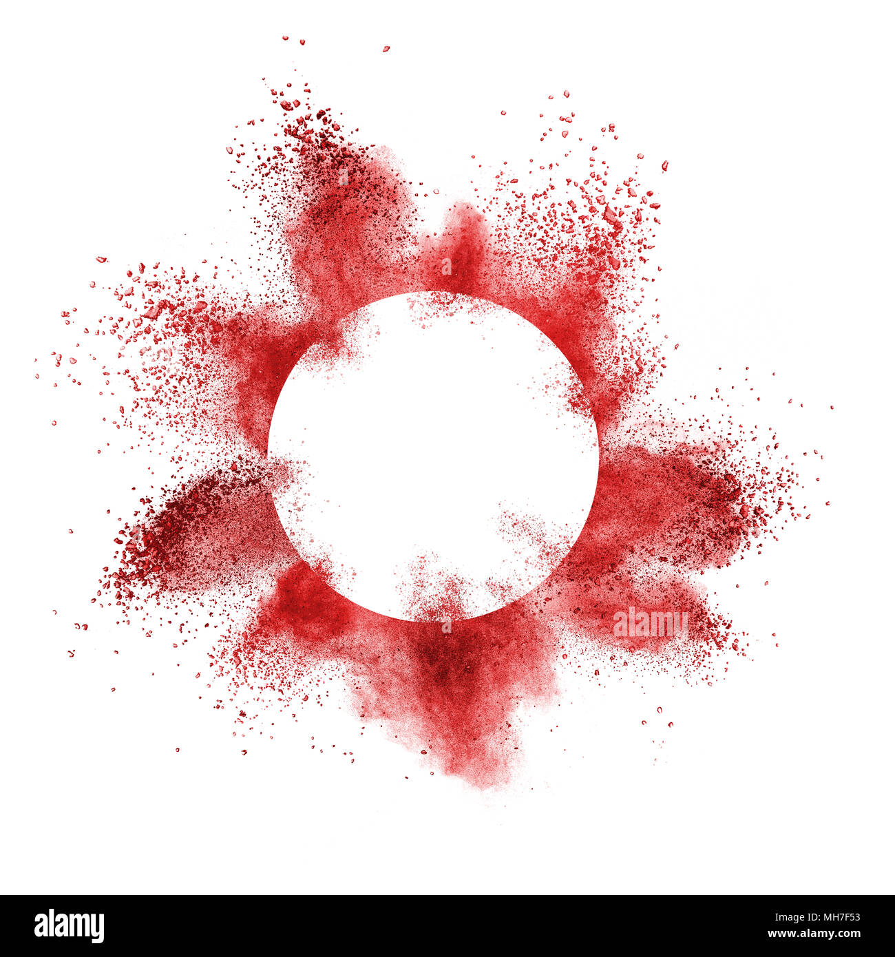 red powder explosion behind a round frame exploding on white background ...
