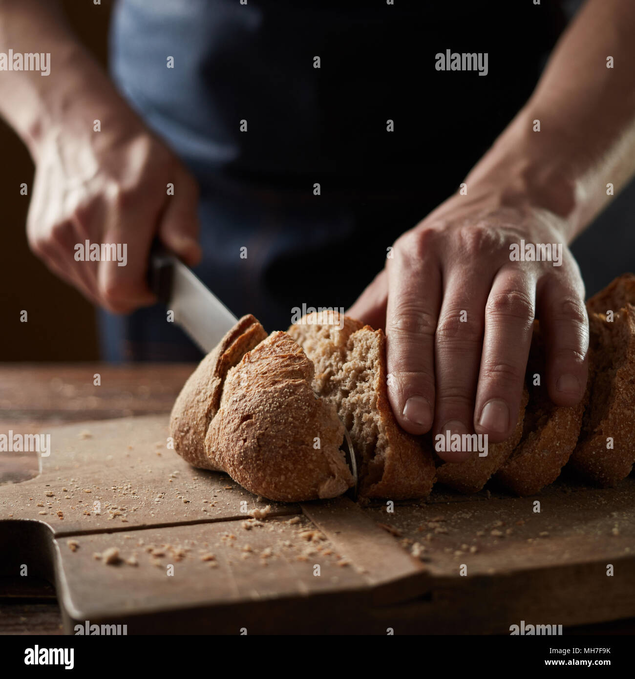 Male hands cutting wheaten hi-res stock photography and images - Alamy