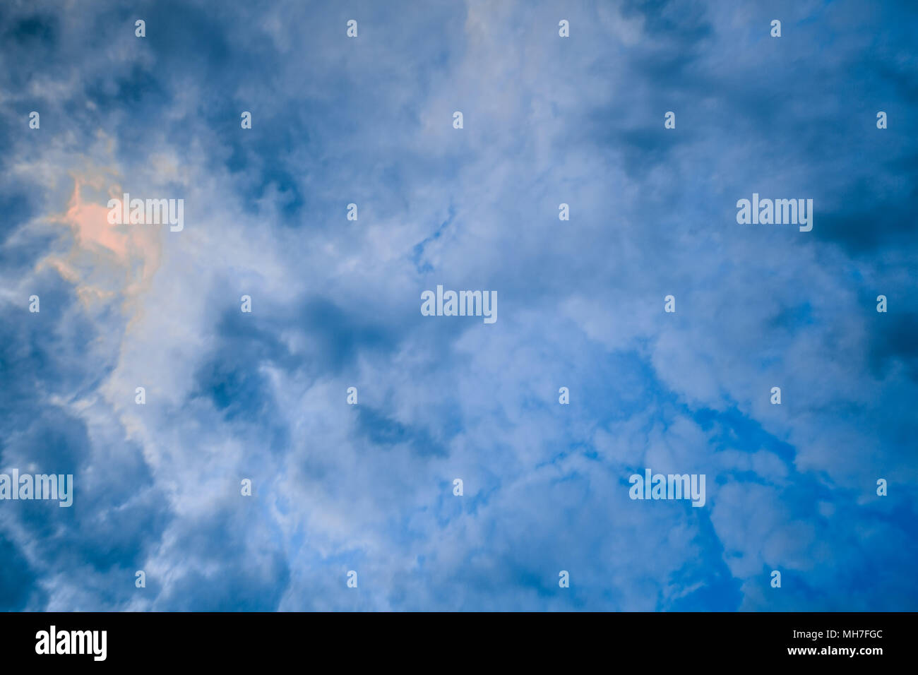 Looking straight up at beautiful clouds in the sky creating intricate ...