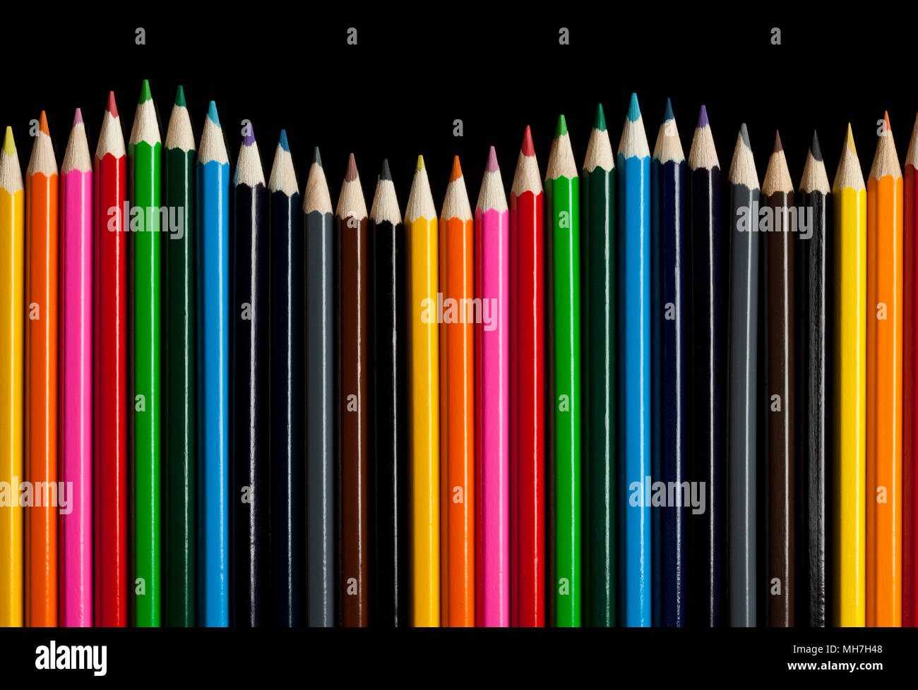 multicolored crayons arranged as a wave Stock Photo - Alamy