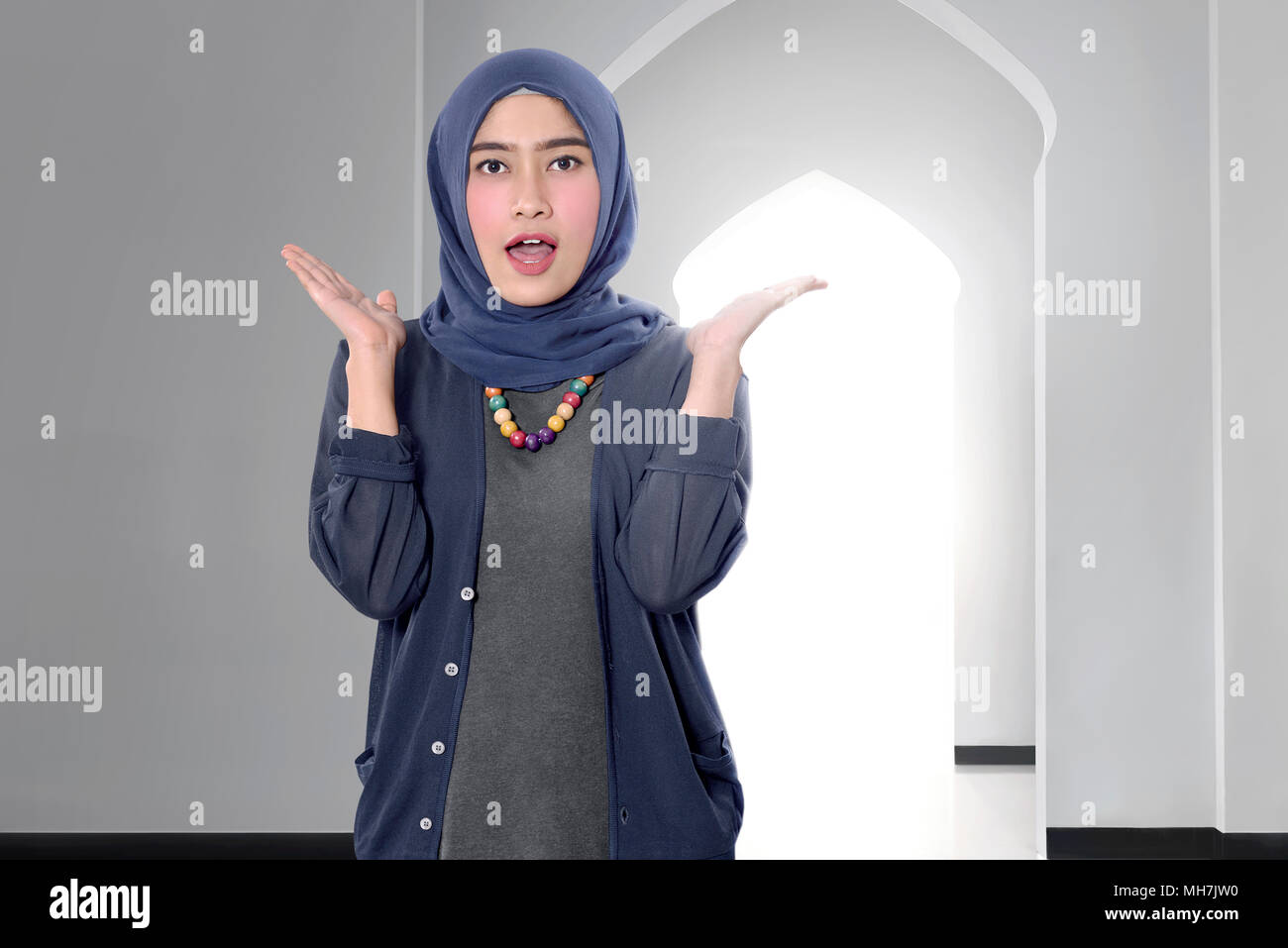 Funny asian female muslim woman with hijab on the mosque Stock Photo ...