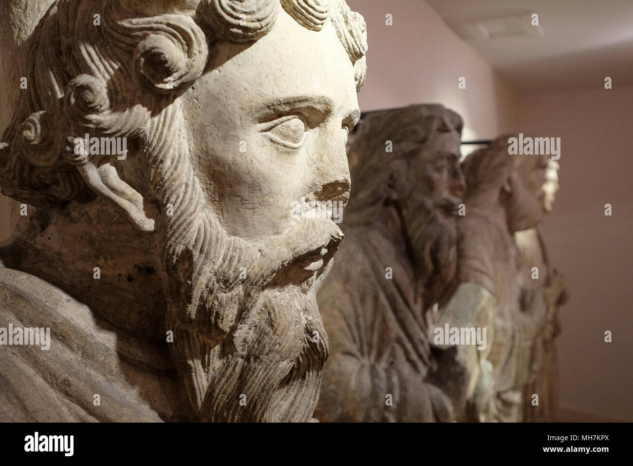 Statues on display inside York Museum Stock Photo - Alamy