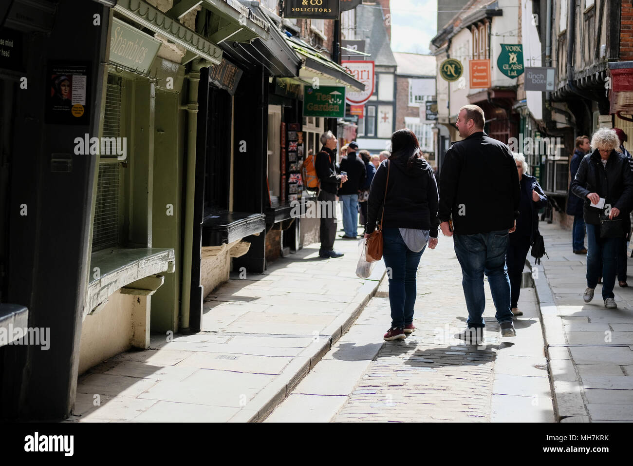 Visitors walking along The Shambles in York Stock Photo - Alamy