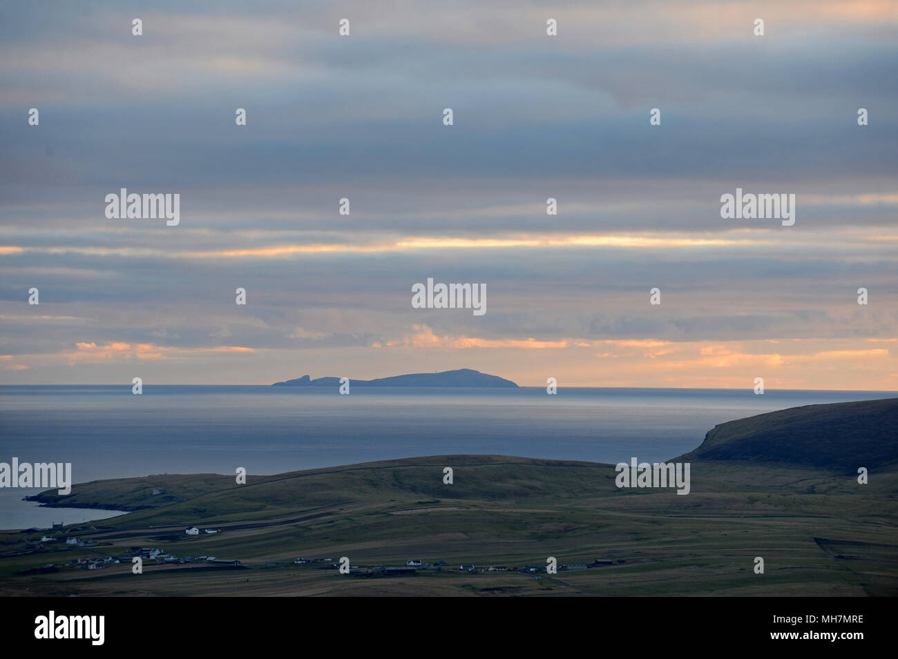 Fair Isle viewed on the horizon from the south end of the Shetland ...