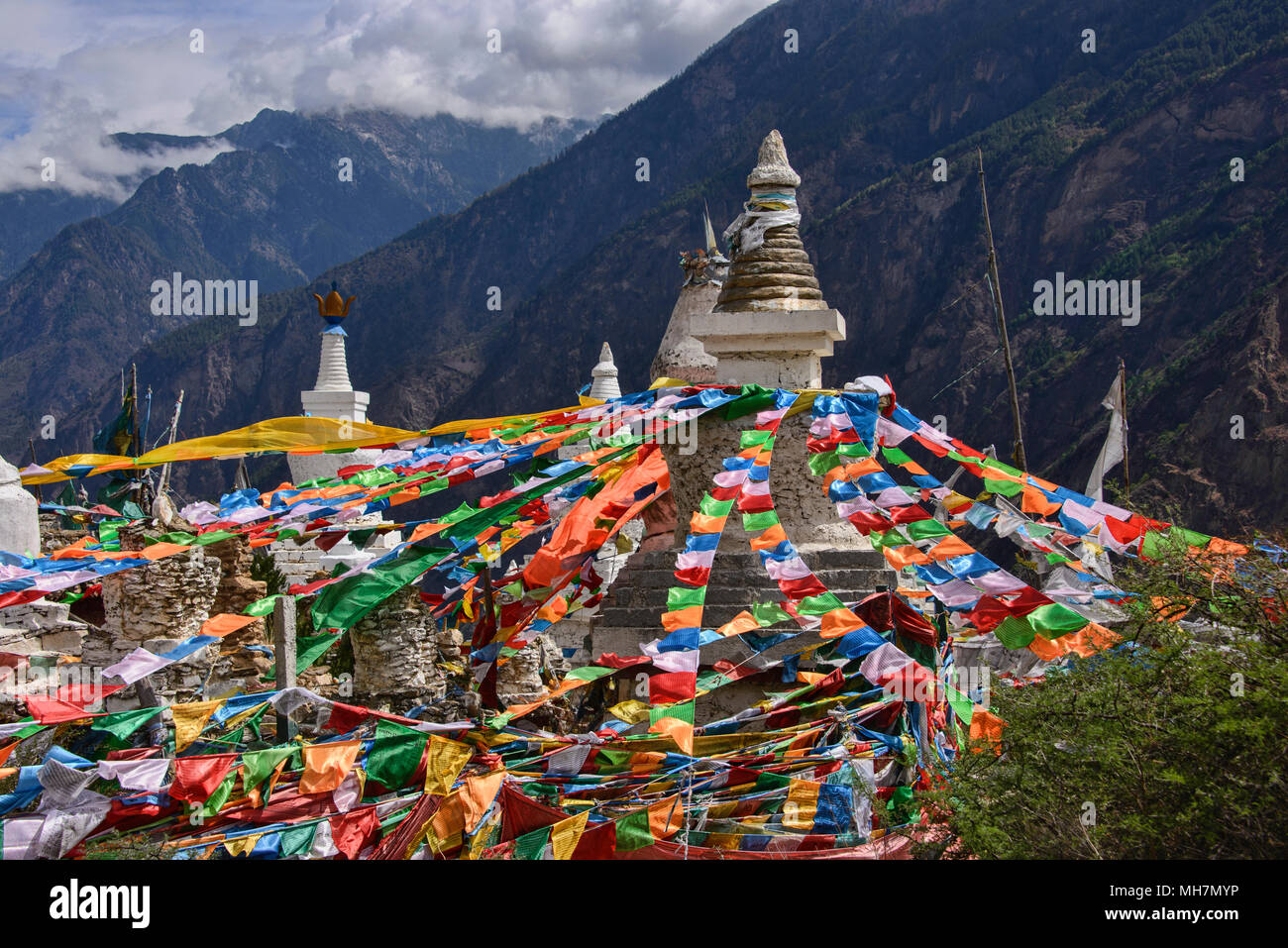 Prayer flags and Stupa in Jiaju, Sichuan, China Stock Photo - Alamy