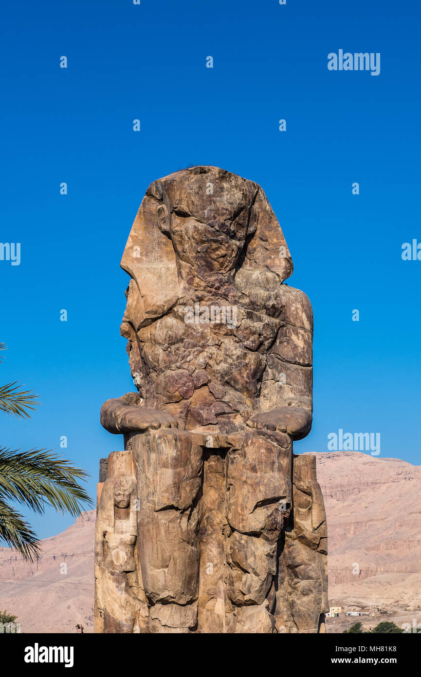 Colossus of Memnon, massive stone statue of Pharaoh Amenhotep III ...