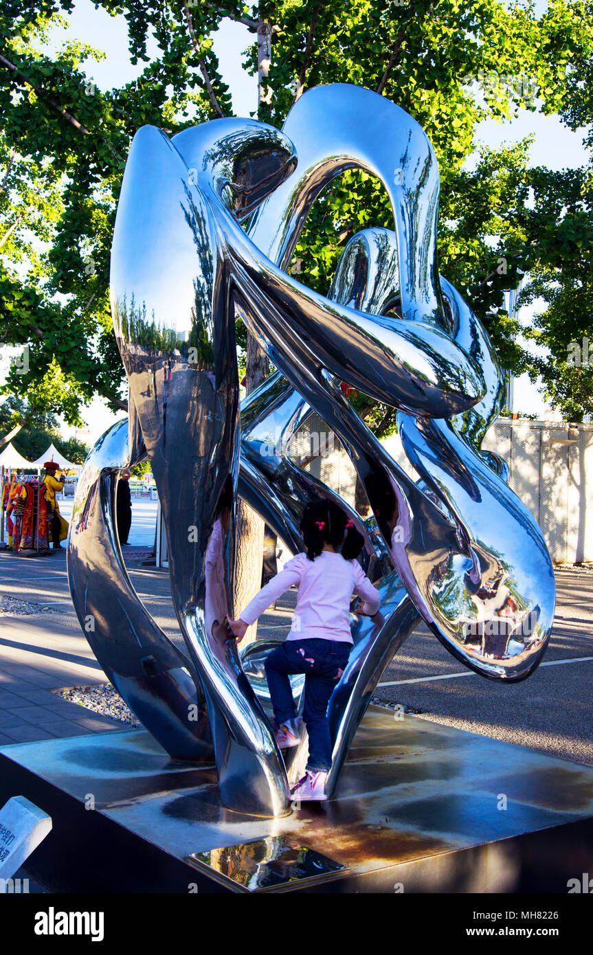 Public artwork in Olympic Park in Beijing, China, with a plaque that ...