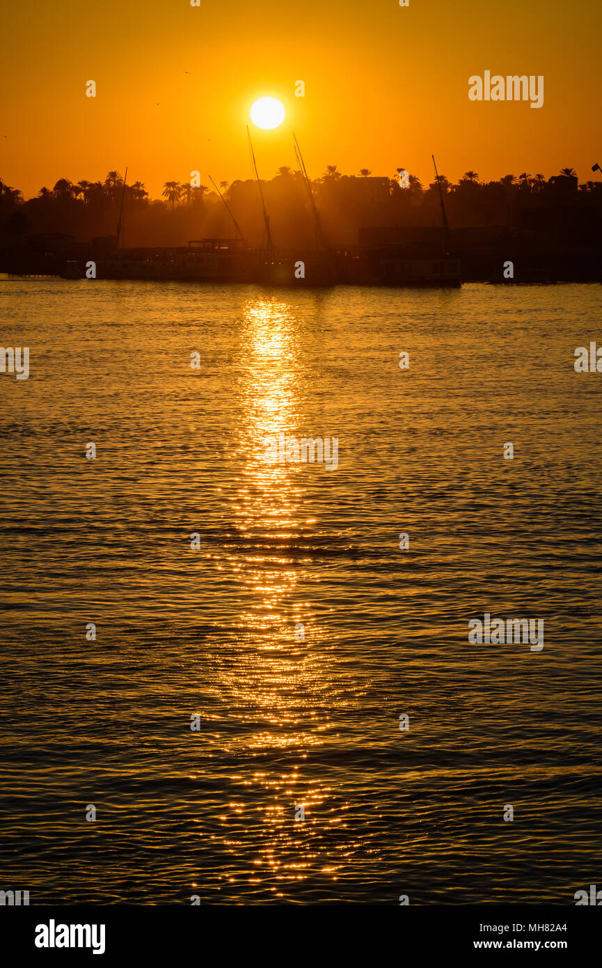 Sunset over the river Nile in Egypt Stock Photo - Alamy