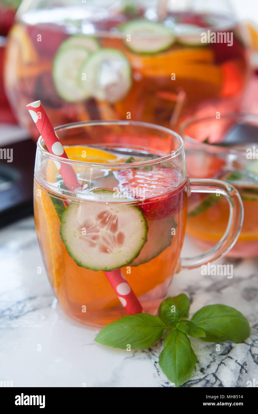 Homemade fruit punch with strawberry, orange and cucumber Stock Photo ...