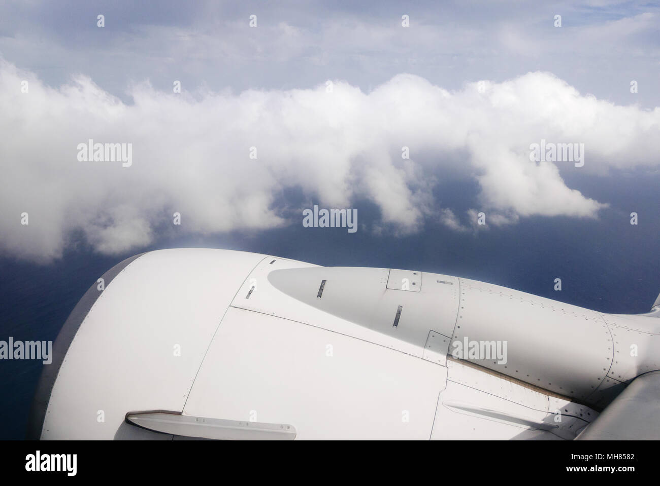 View from plane window on engine and clouds Stock Photo - Alamy