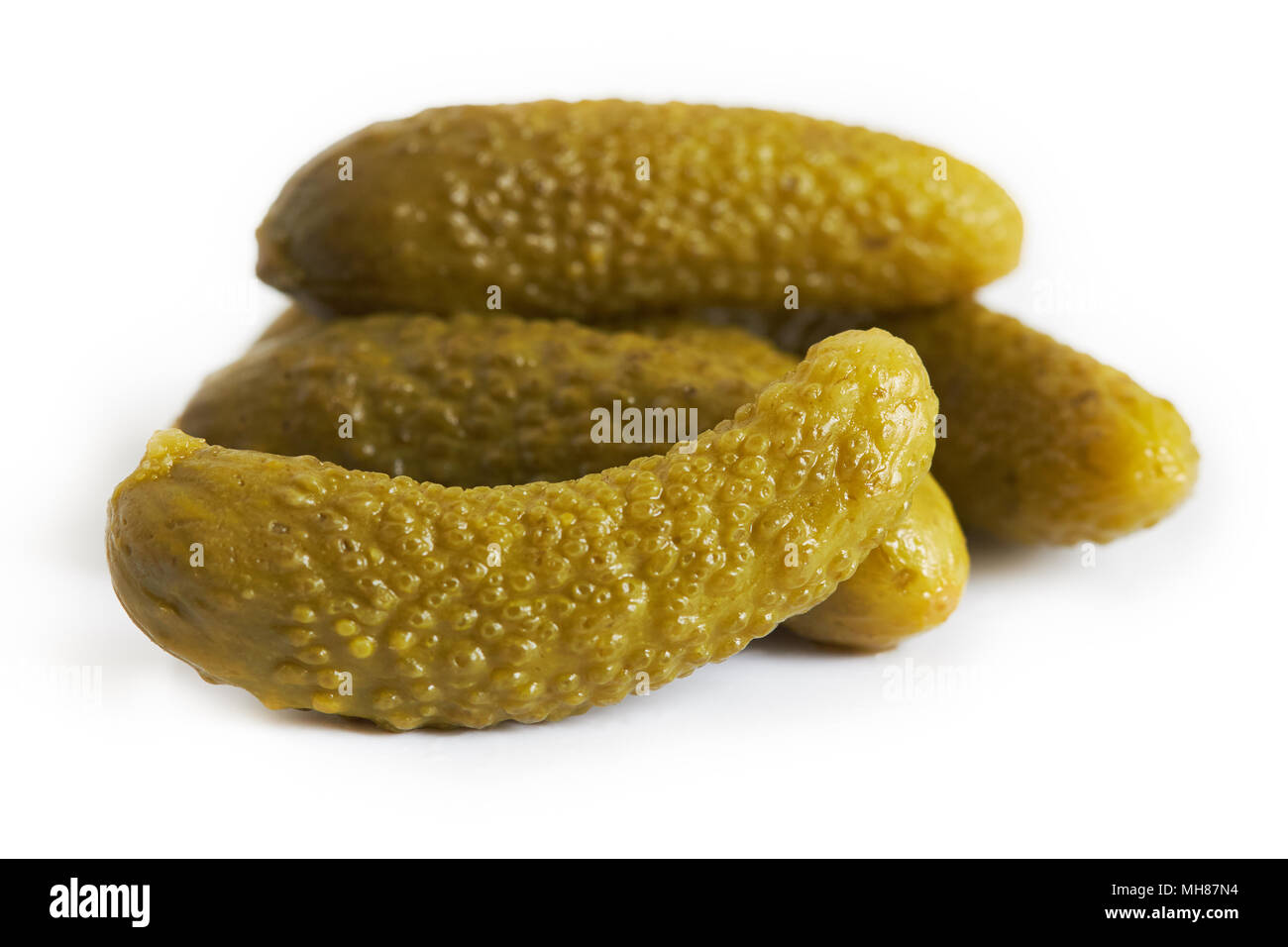Pickled cucumbers, also known as gherkins or cornichons, isolated on ...
