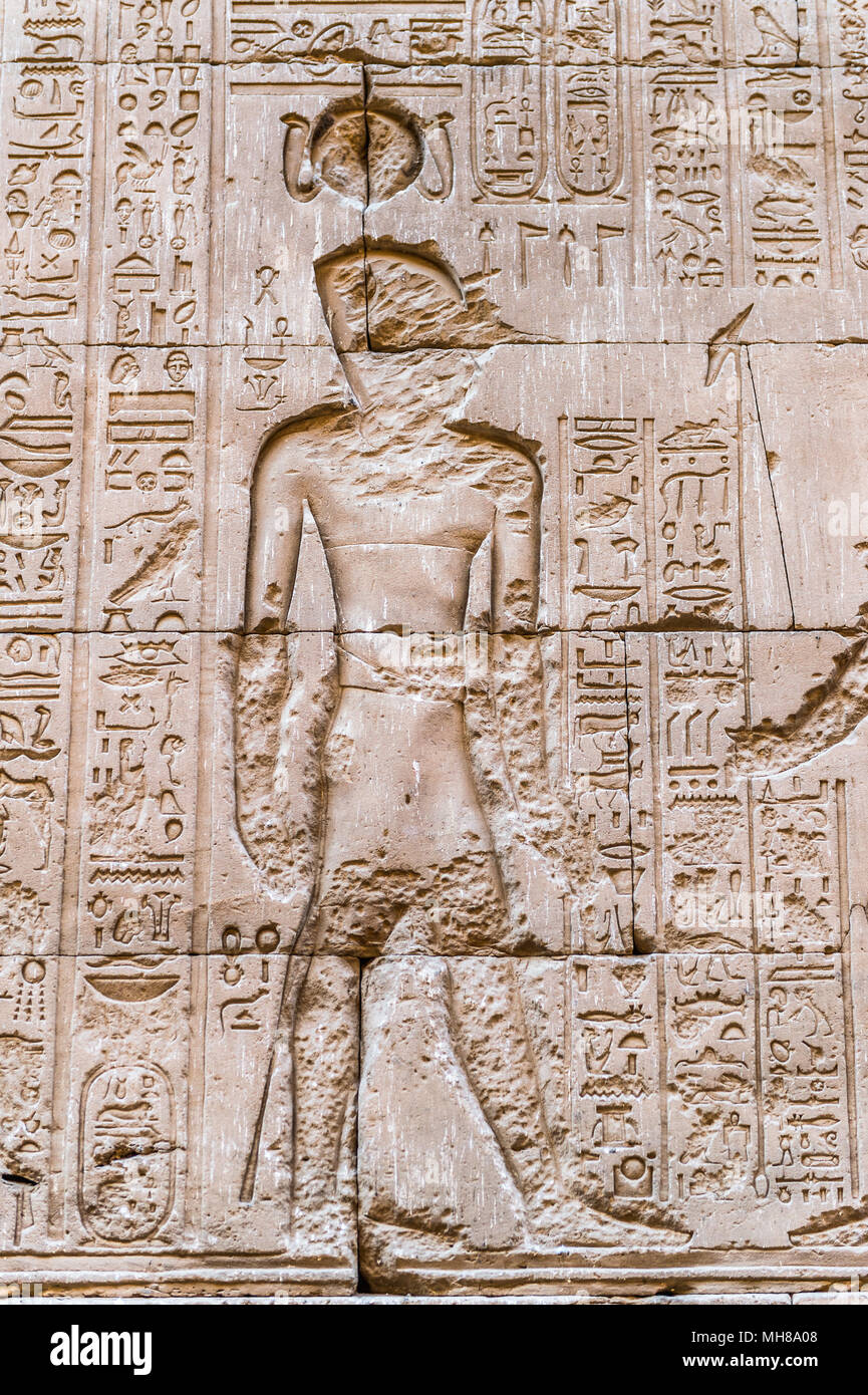 Authentic Hieroglyphic illustration of the Egyptian god on the wall in ...