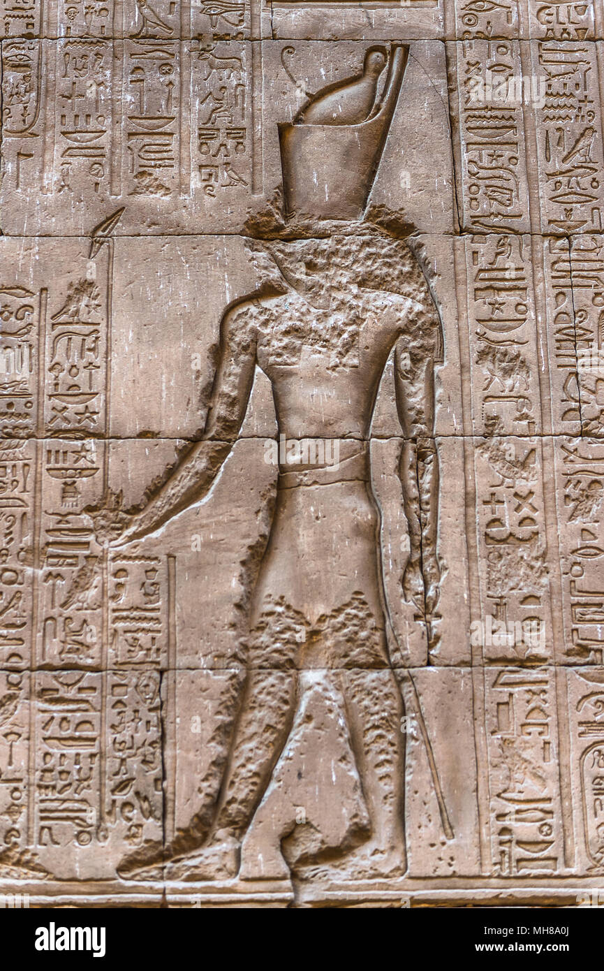 Authentic Hieroglyphic illustration of the Egyptian god on the wall in ...