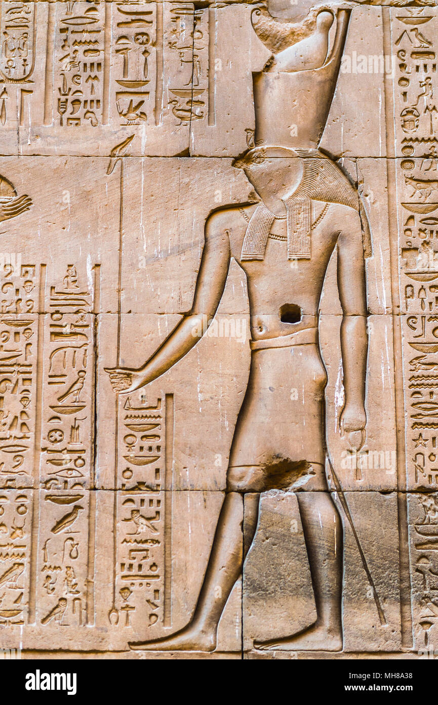 Authentic Hieroglyphic illustration of the Egyptian god on the wall in ...