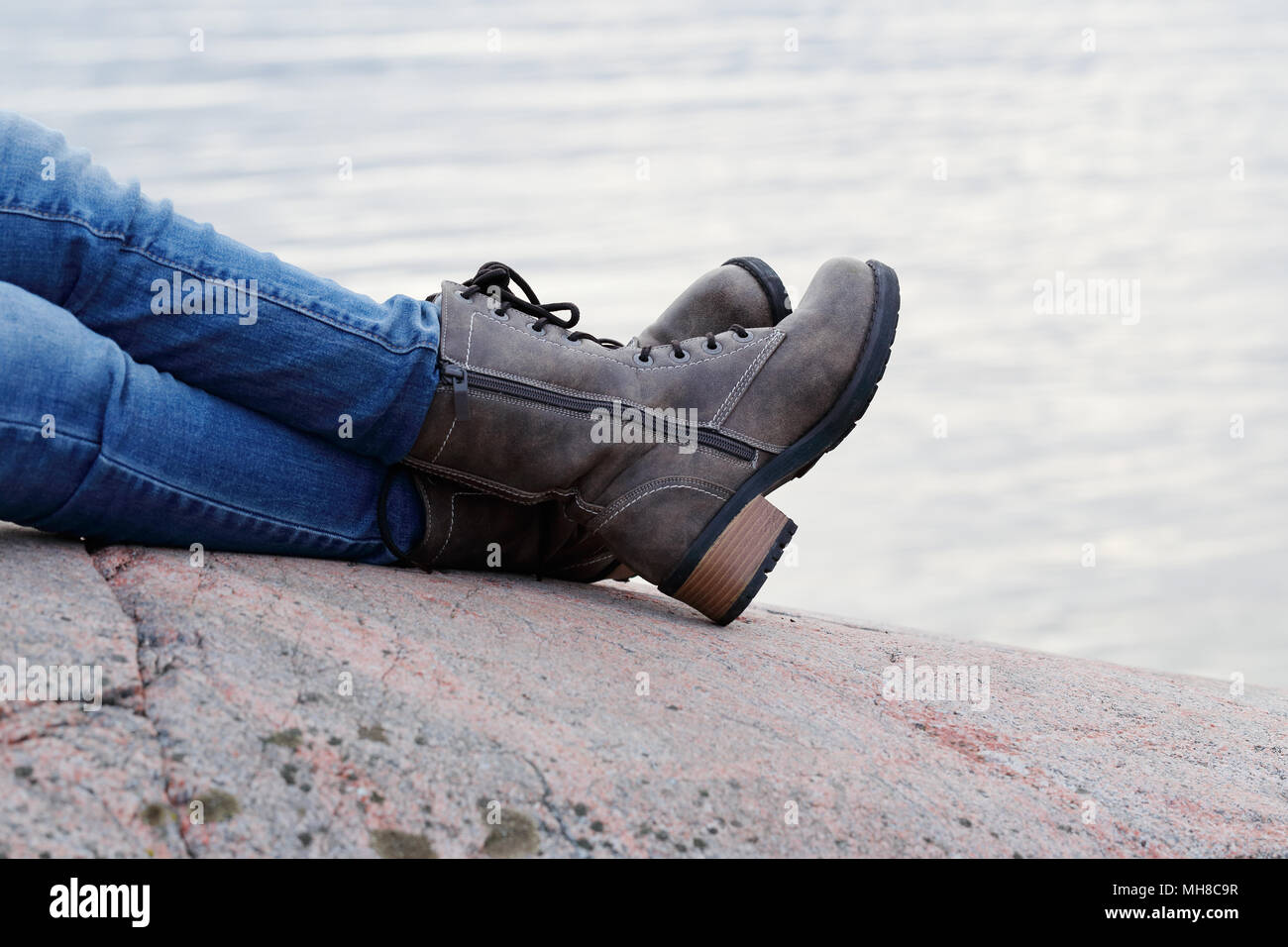 Legs with boots hi-res stock photography and images - Alamy