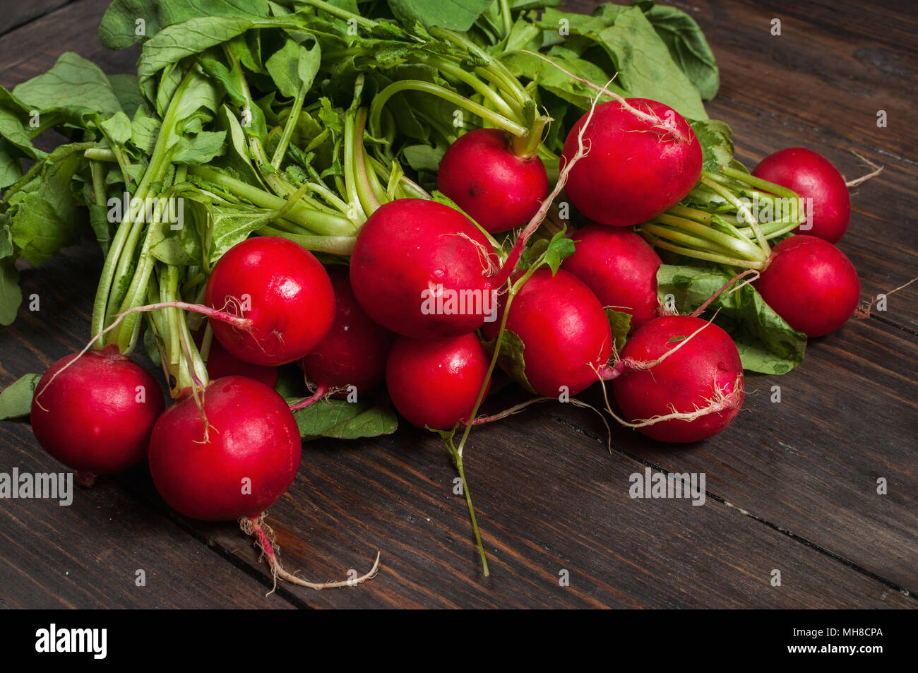 Fresh radish on old wooden table. Radish background. Rustic Style Stock ...