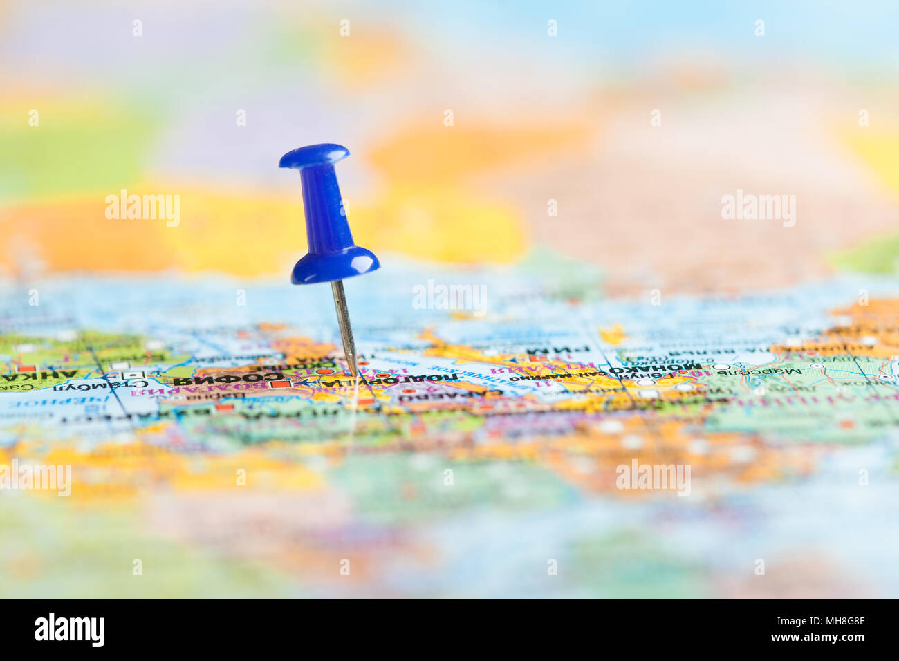 Travel destination, blue pin on the map Stock Photo - Alamy