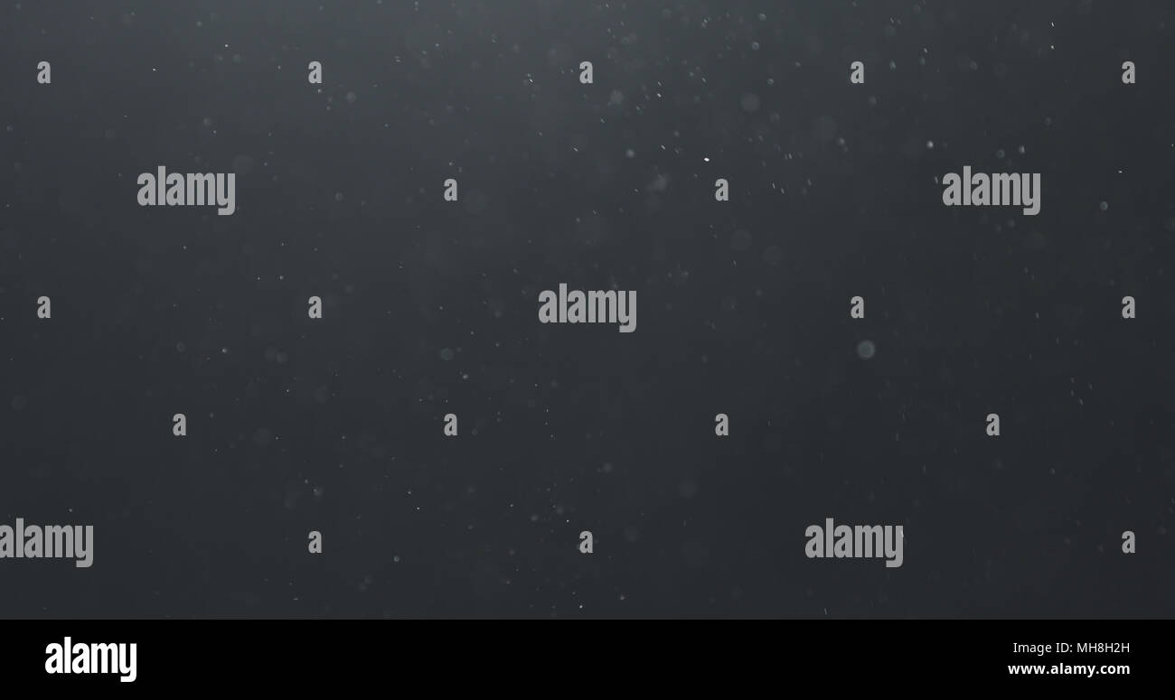 real dust floating in air over dark background Stock Photo - Alamy