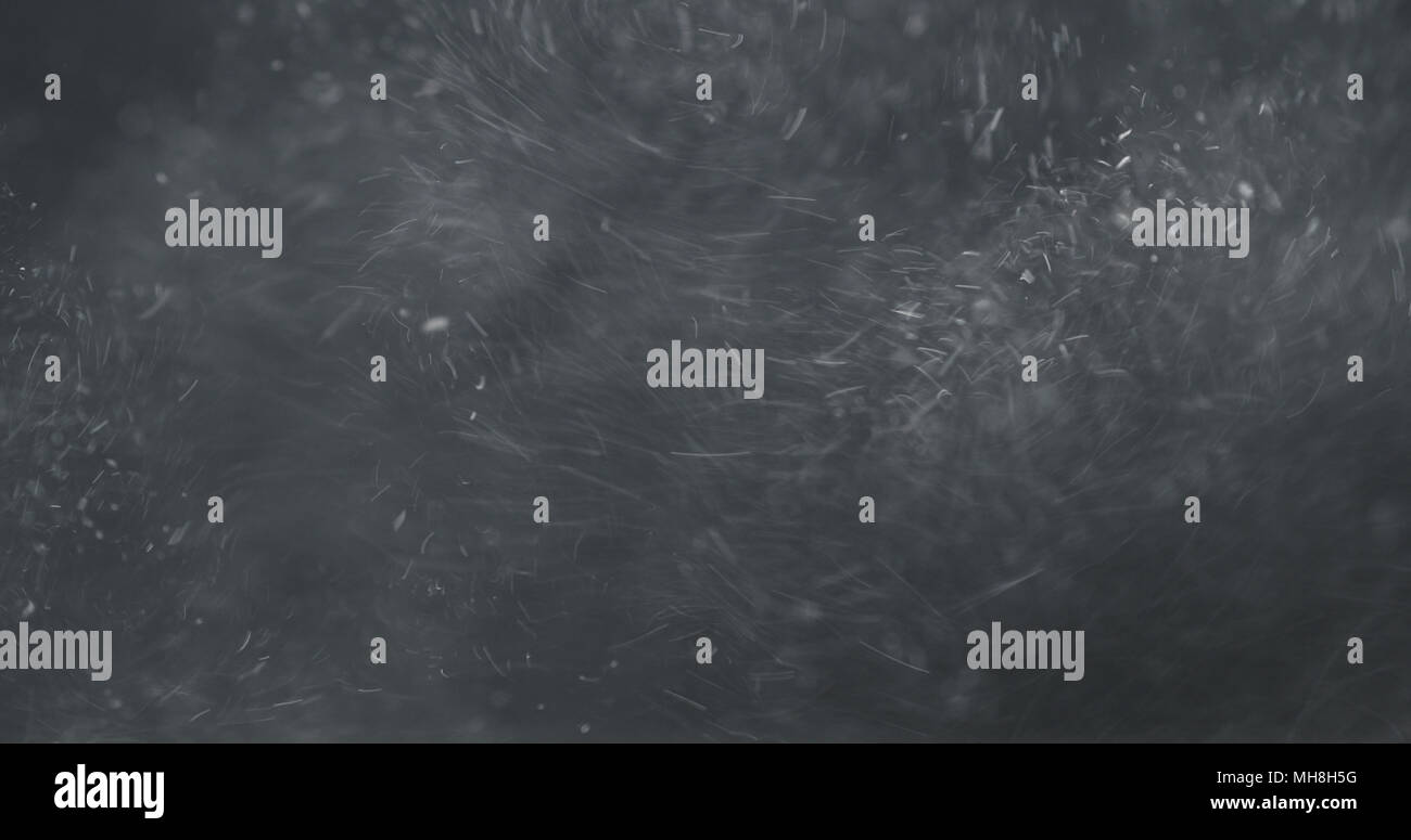 real dust floating in air over dark background Stock Photo - Alamy