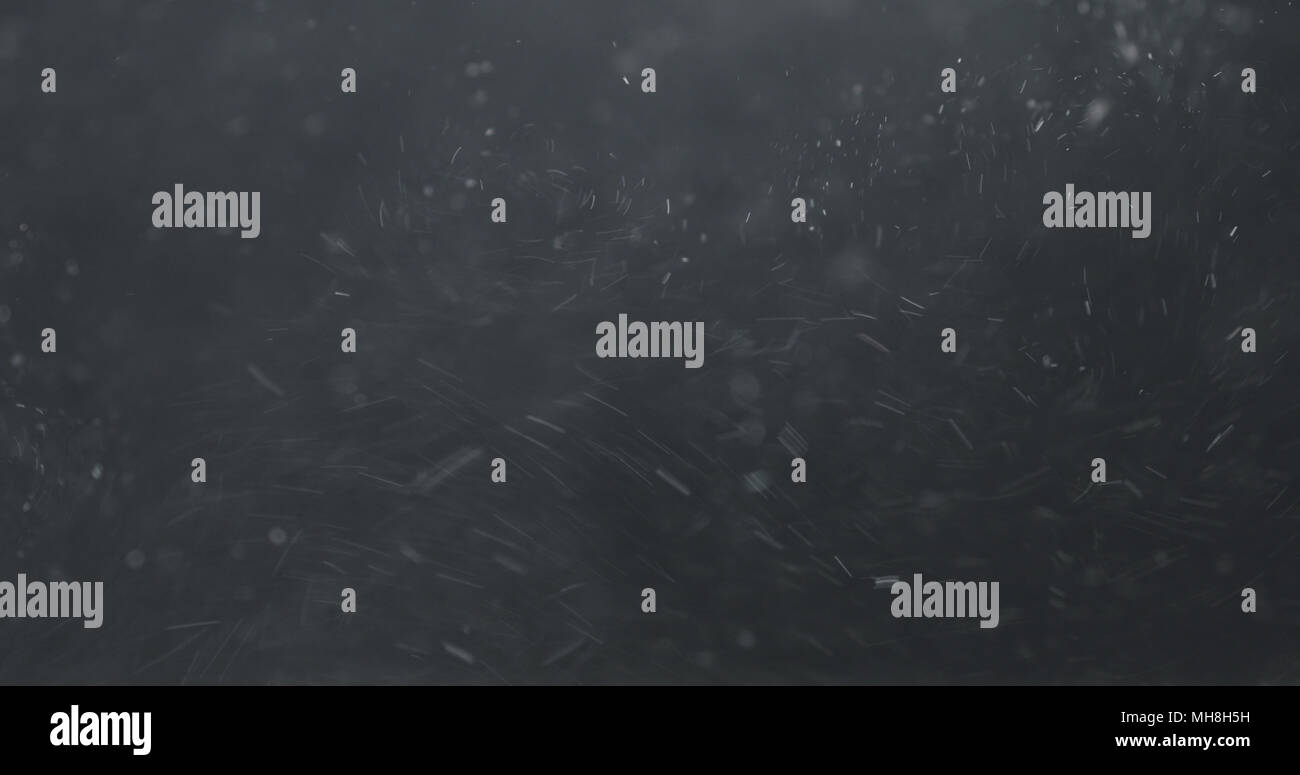 real dust floating in air over dark background Stock Photo - Alamy