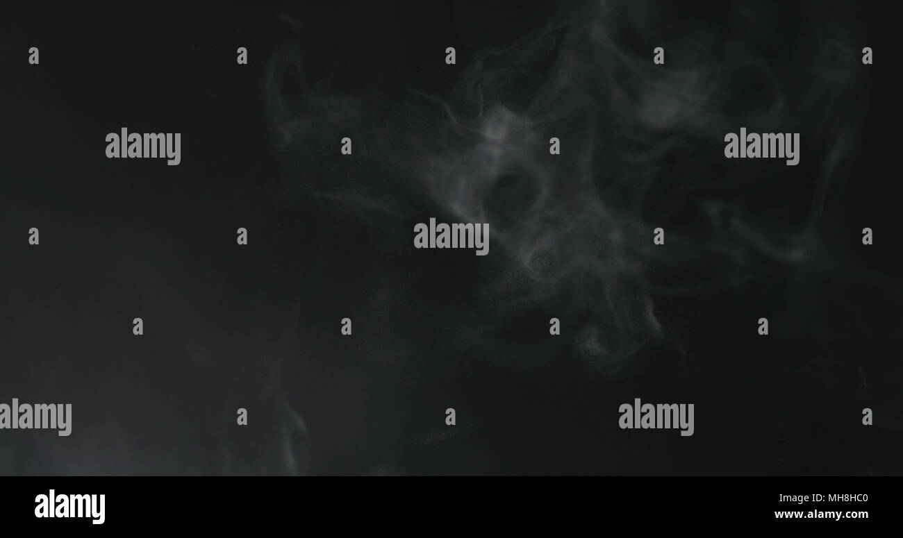 vapor steam rising over black background Stock Photo - Alamy