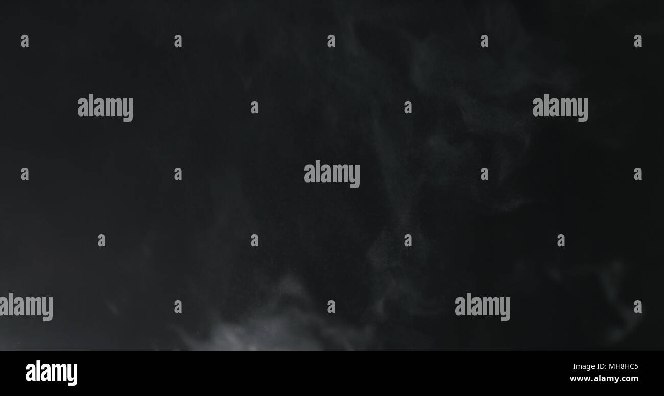vapor steam rising over black background Stock Photo - Alamy