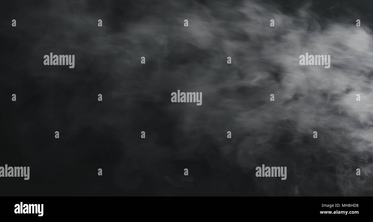 vapor steam from right over black background Stock Photo - Alamy