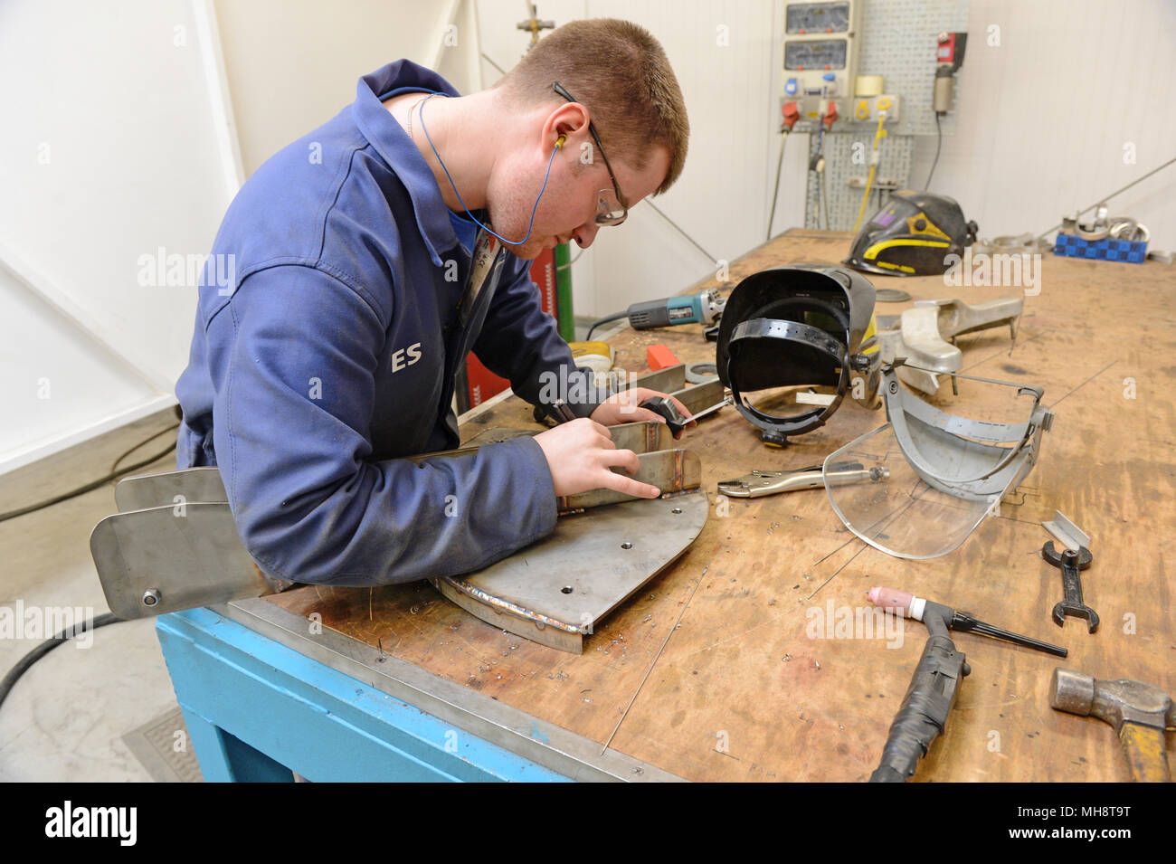 Welder marking up metal work before welding Stock Photo - Alamy