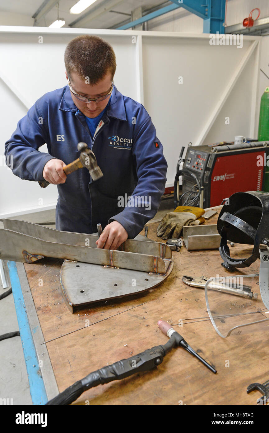 Welder marking up metal work before welding Stock Photo - Alamy