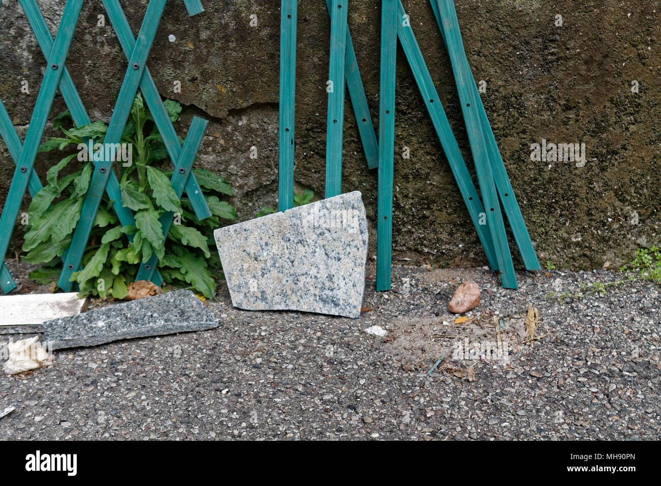 Lonely stone on asphalt backdrop with shadow, abstract art Stock Photo ...