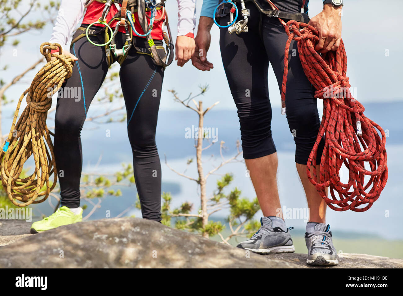 couple of climbers with ropes Stock Photo - Alamy