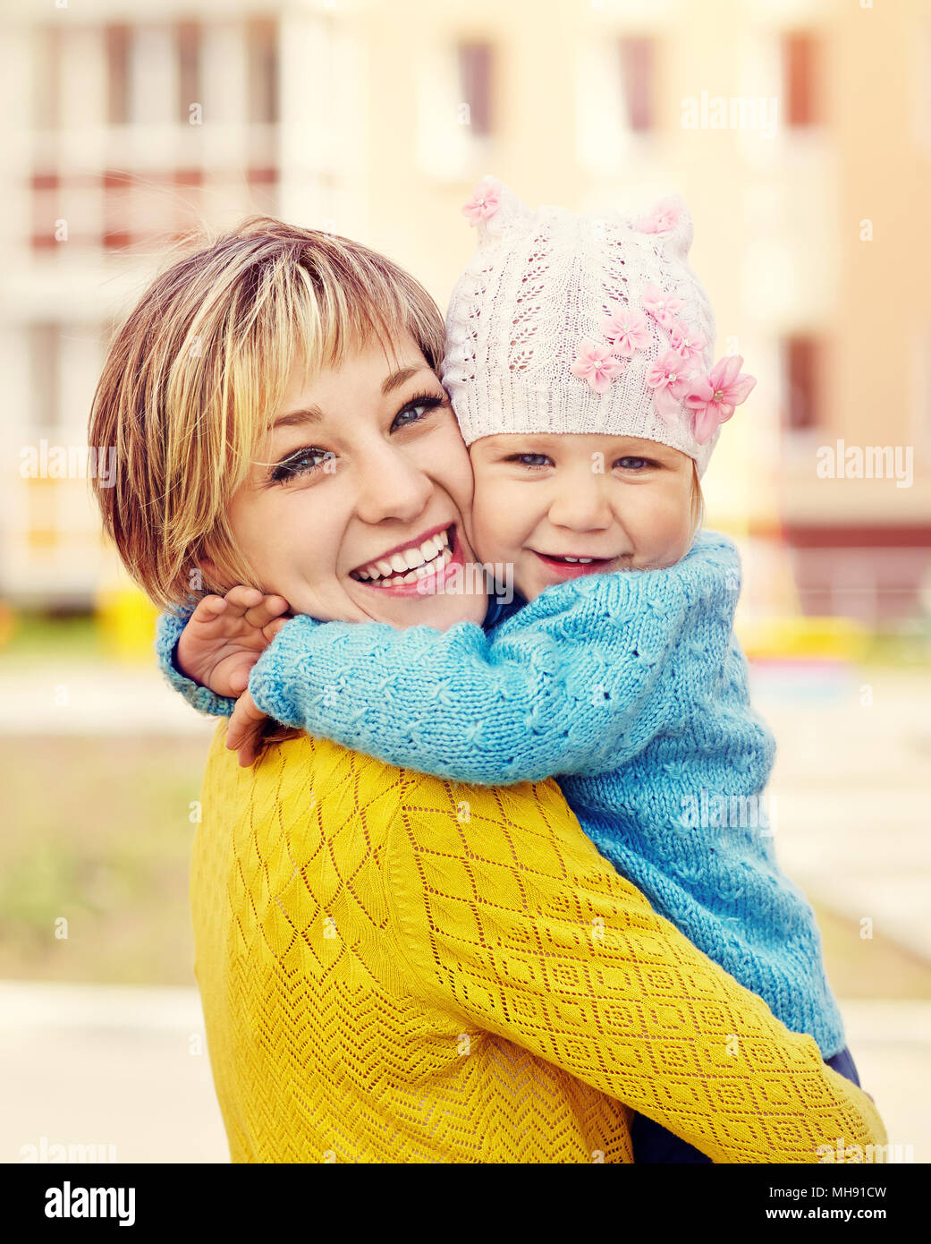 Baby with active mother hi-res stock photography and images - Alamy