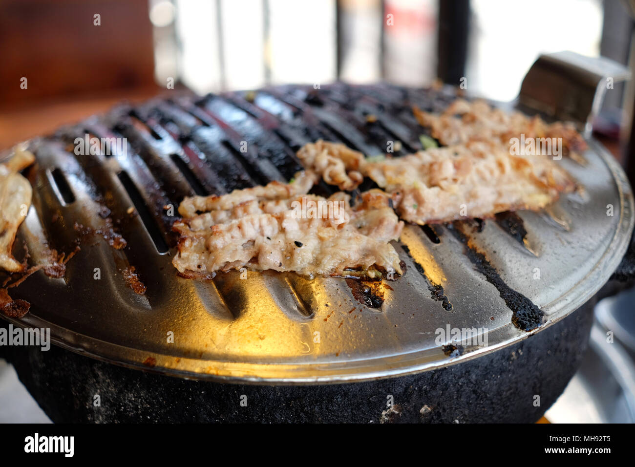 Korean traditional cuisine: meat on fire roaster Stock Photo - Alamy