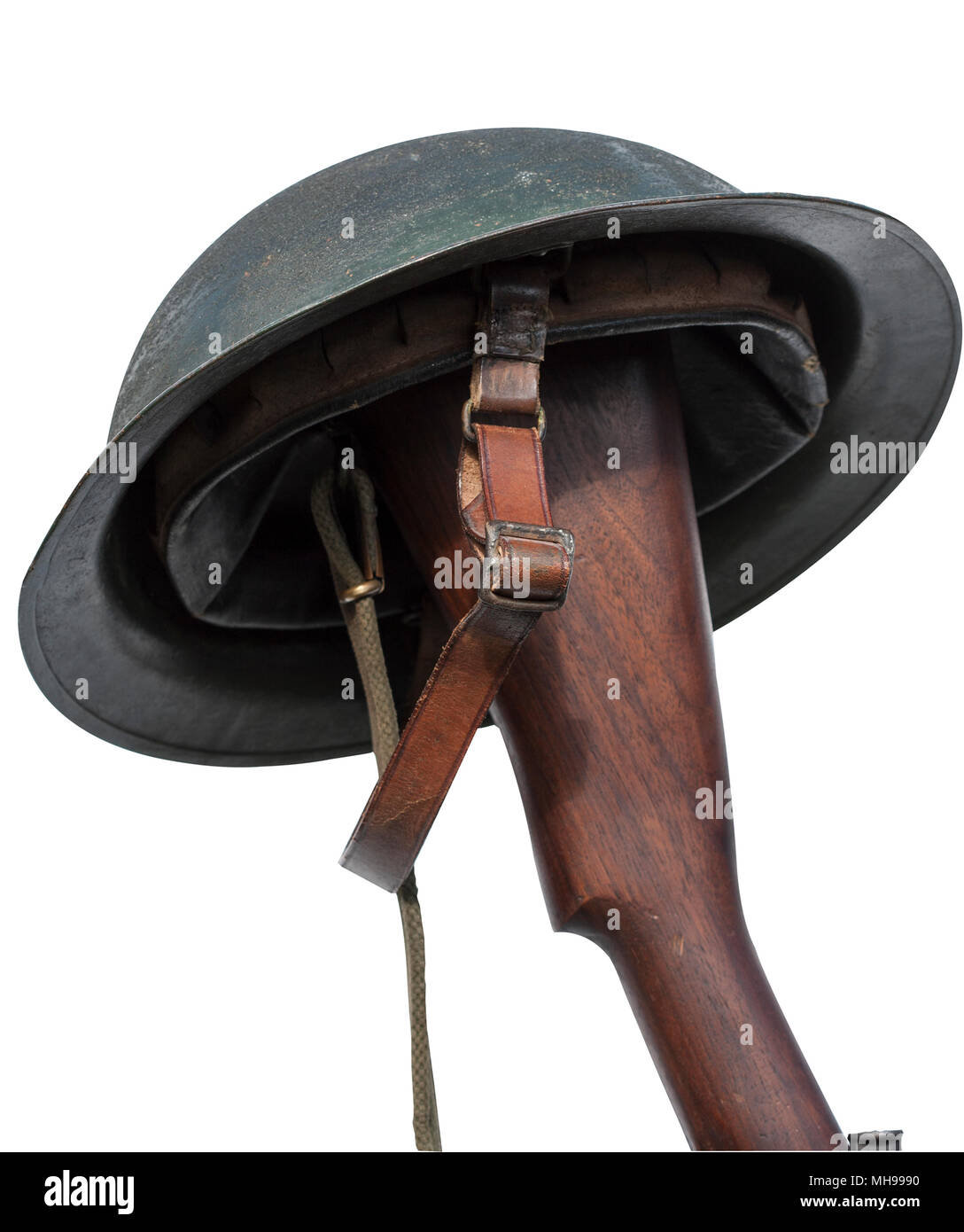 Helmet on a rifle butt Stock Photo - Alamy