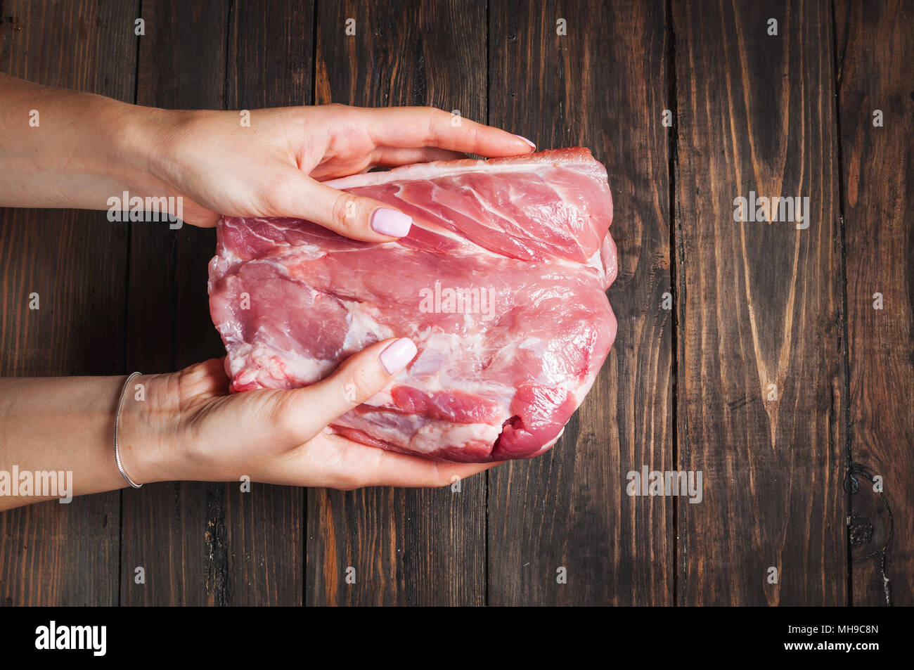 Hands holding meat hi-res stock photography and images - Alamy