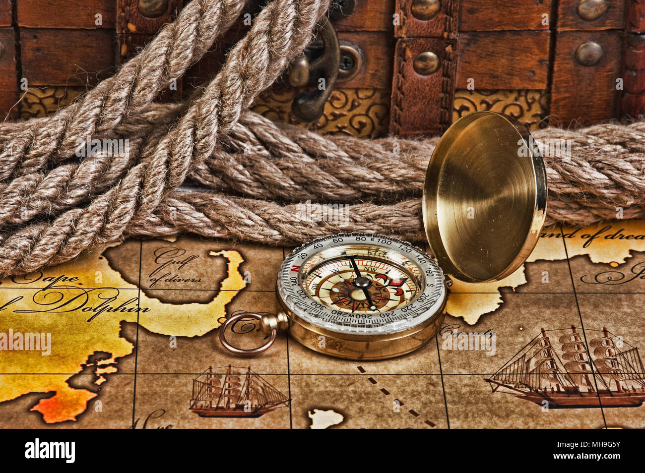 compass and rope on a map Stock Photo - Alamy
