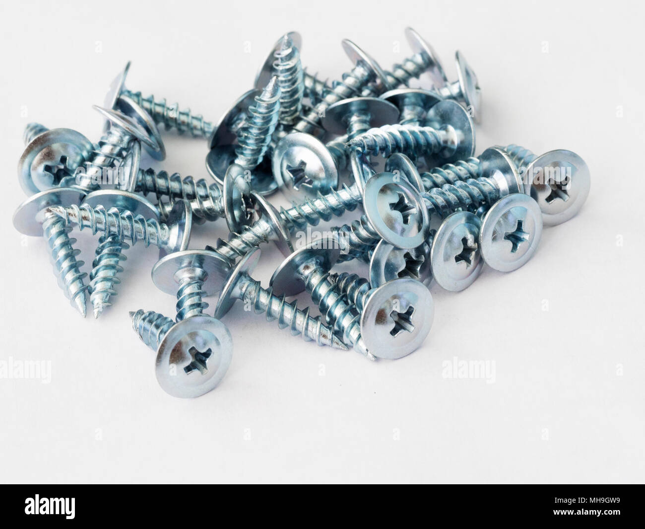 16 mm self tapping screws isolated on white background Stock Photo - Alamy