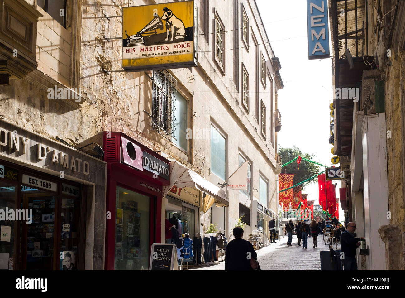 Valletta's streets are packed with small shops selling well recognized ...