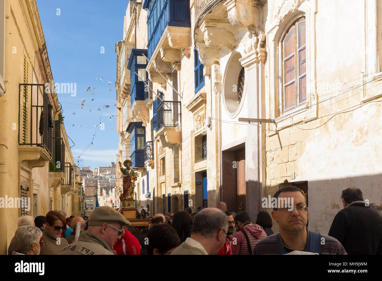 One of many street parades celebrating saints on the streets of ...