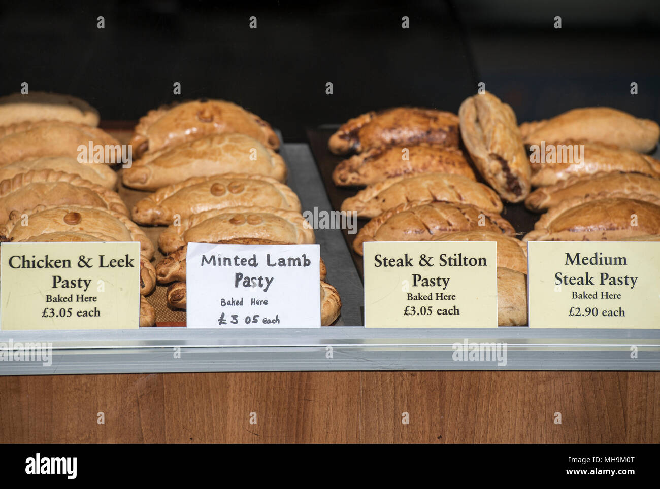 Cornish pasties on display in a bakery shop window in St Ives, Cornwall ...